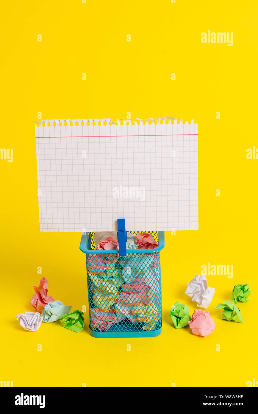 Trash bin crumpled paper clothespin empty reminder office supplies ...