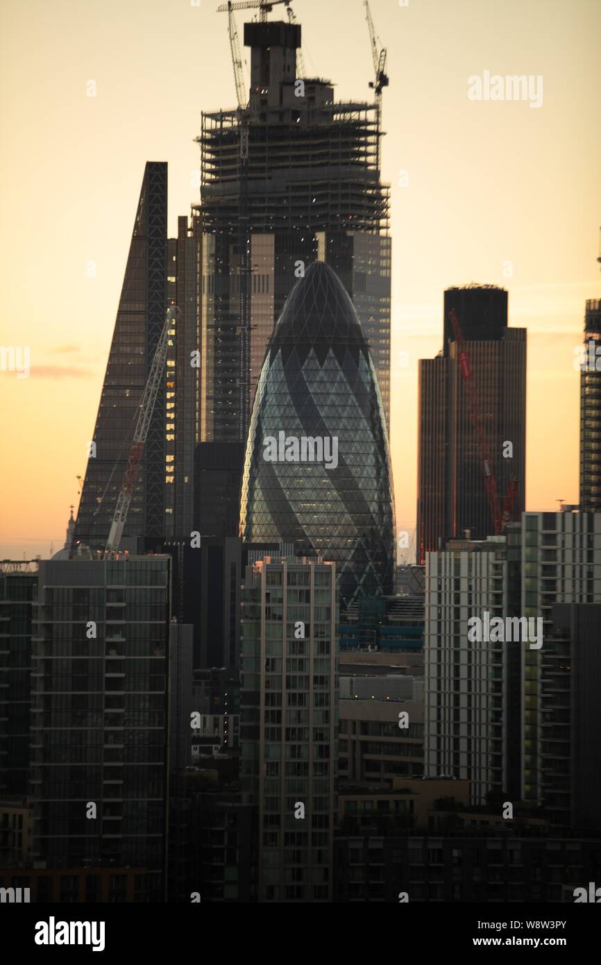 Vertical shot of modern architecture with high rise buildings at dusk ...