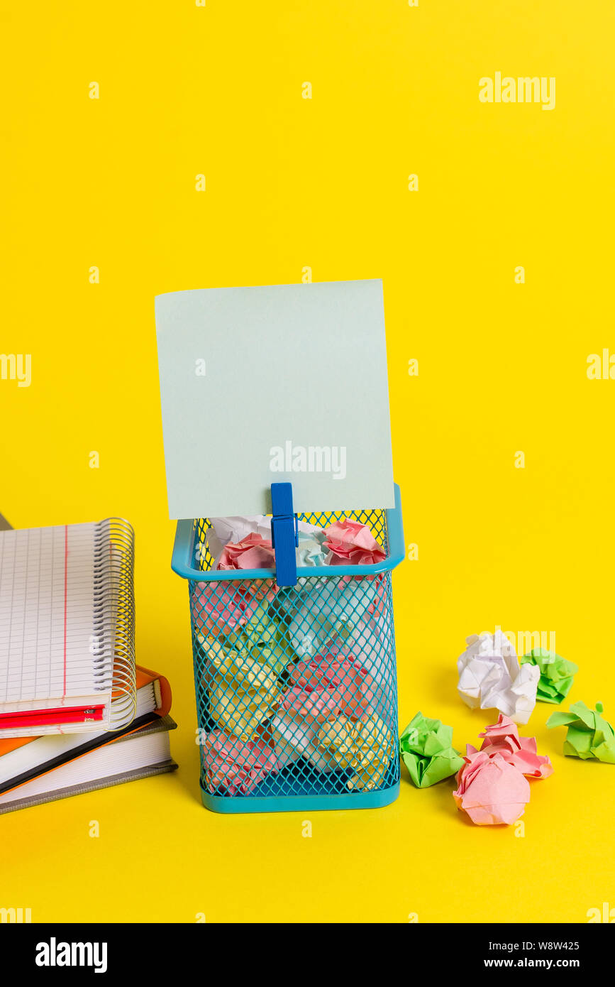 Trash bin crumpled paper clothespin empty reminder office supplies ...