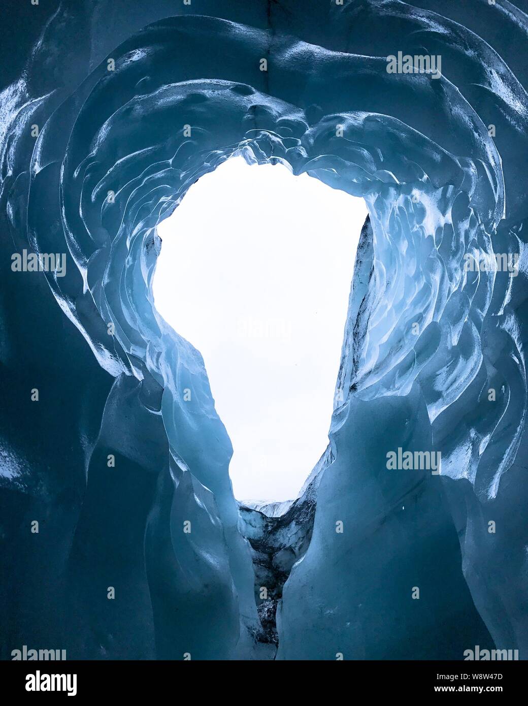 Hole in ice shot from below Stock Photo - Alamy