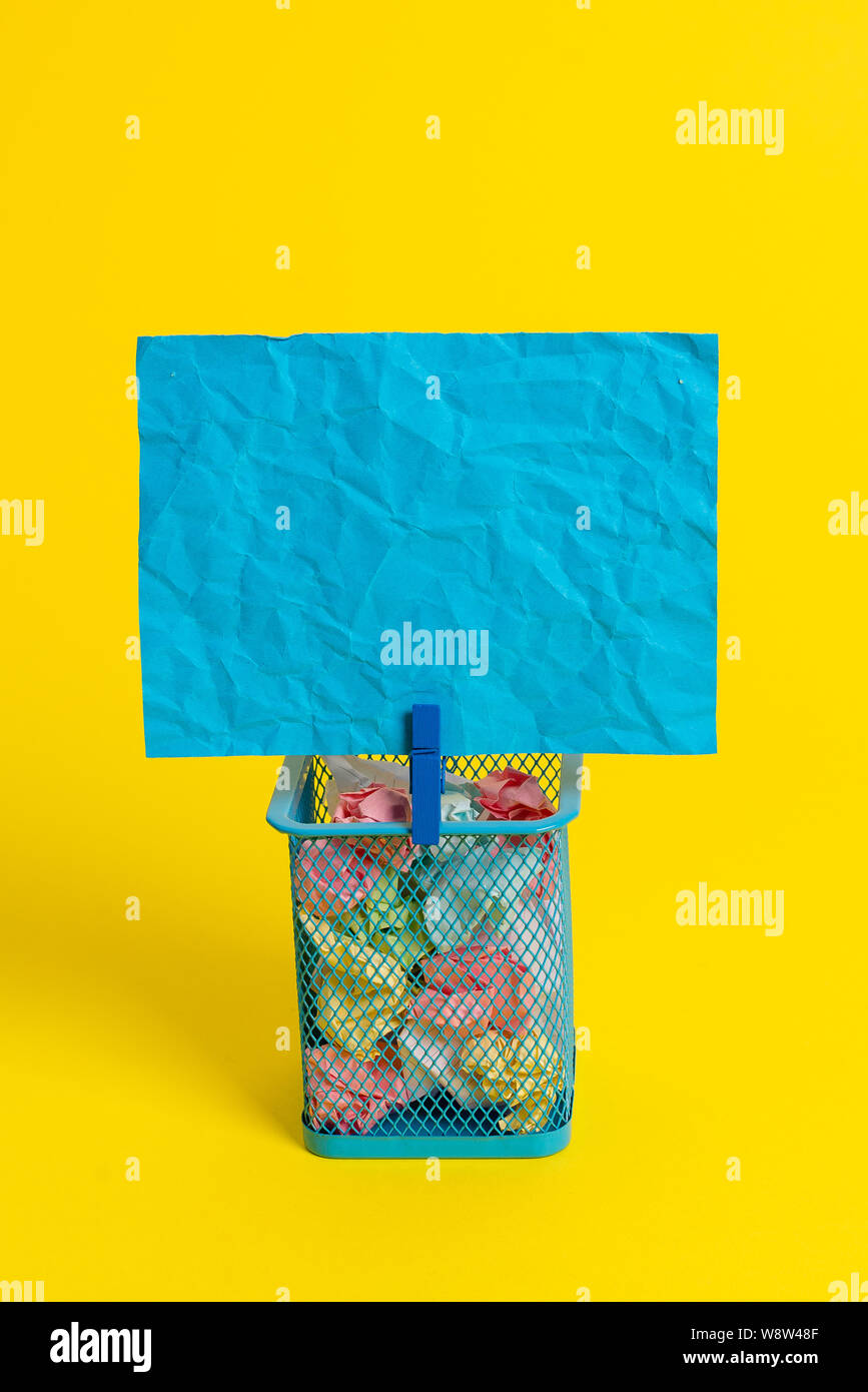 Trash bin crumpled paper clothespin empty reminder office supplies ...