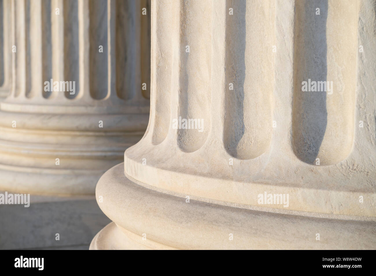 White marble neoclassical columns in soft sunset light at the Supreme ...