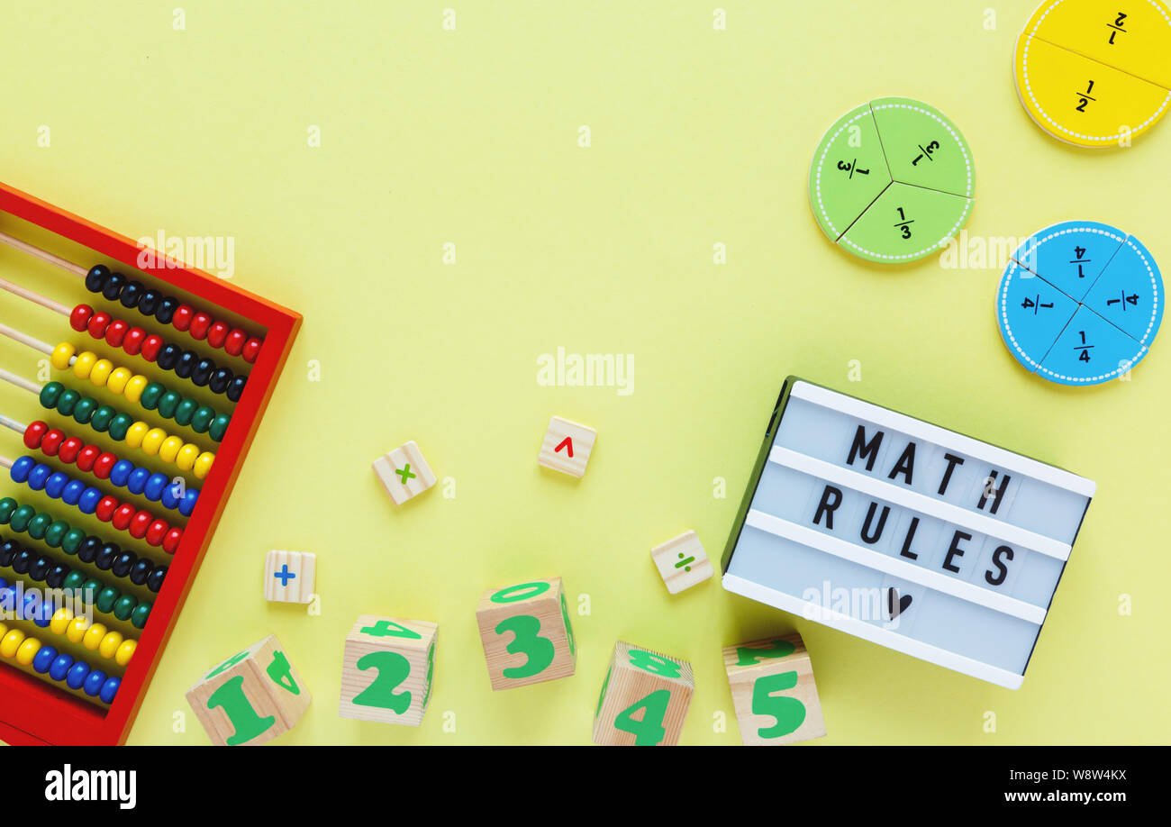 Creative Сolorful blocks, light box, fractions on yellow background ...