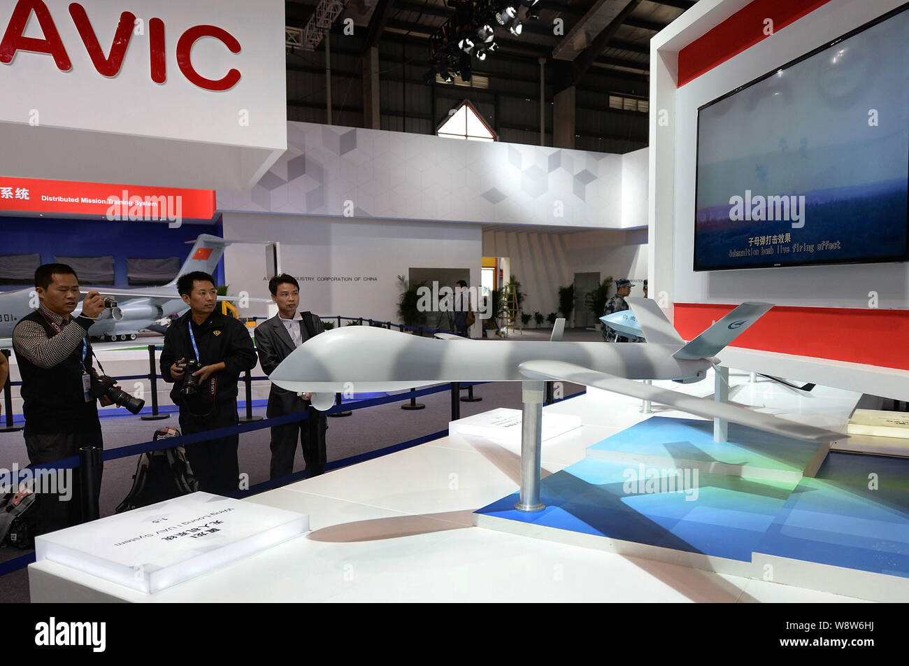 Visitors look at a model of China's Wing-Loong 1 UAV system ofAVIC ...