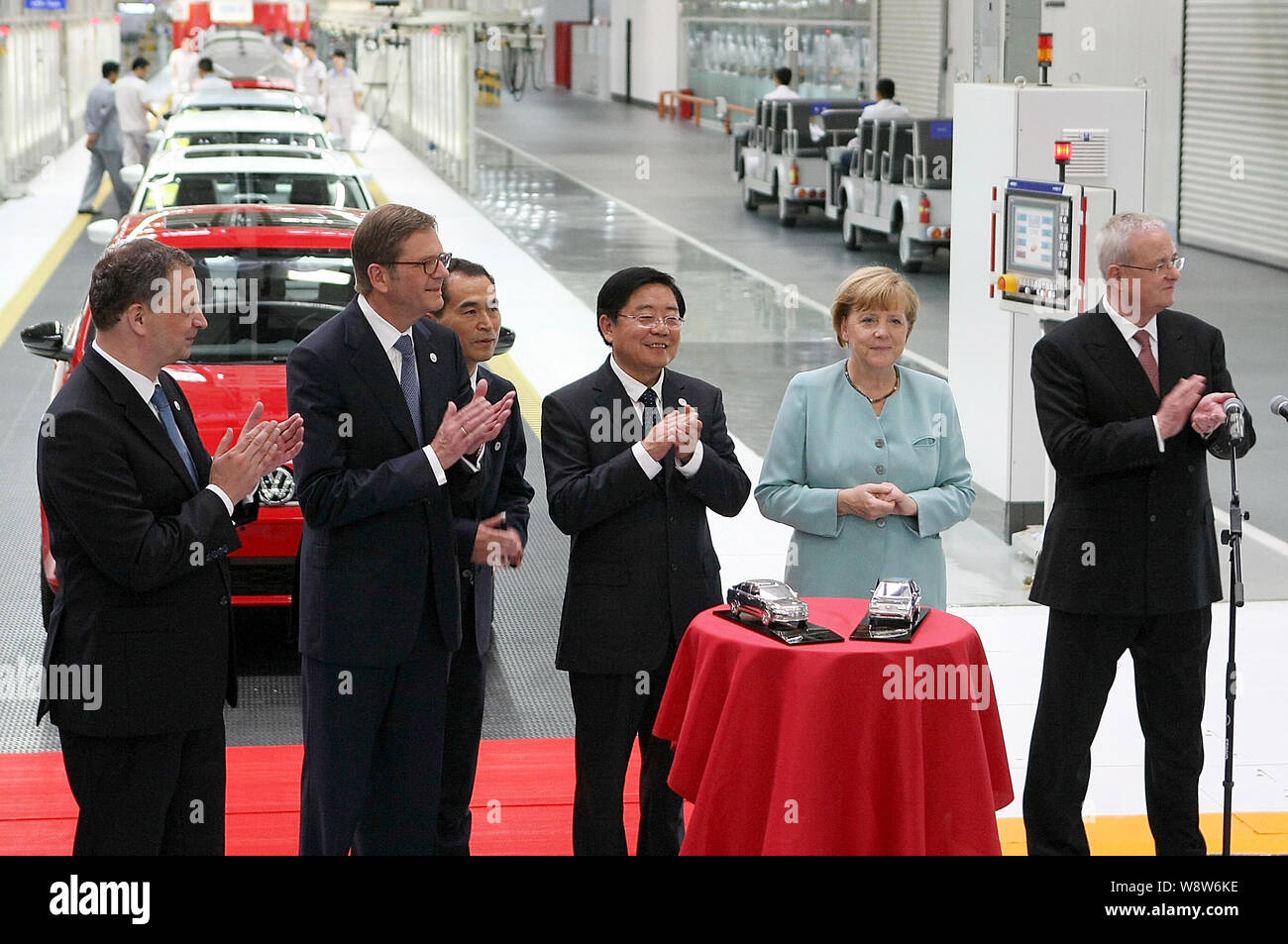 (From second left to right) Dr. Jochem Heizmann, President and CEO of ...