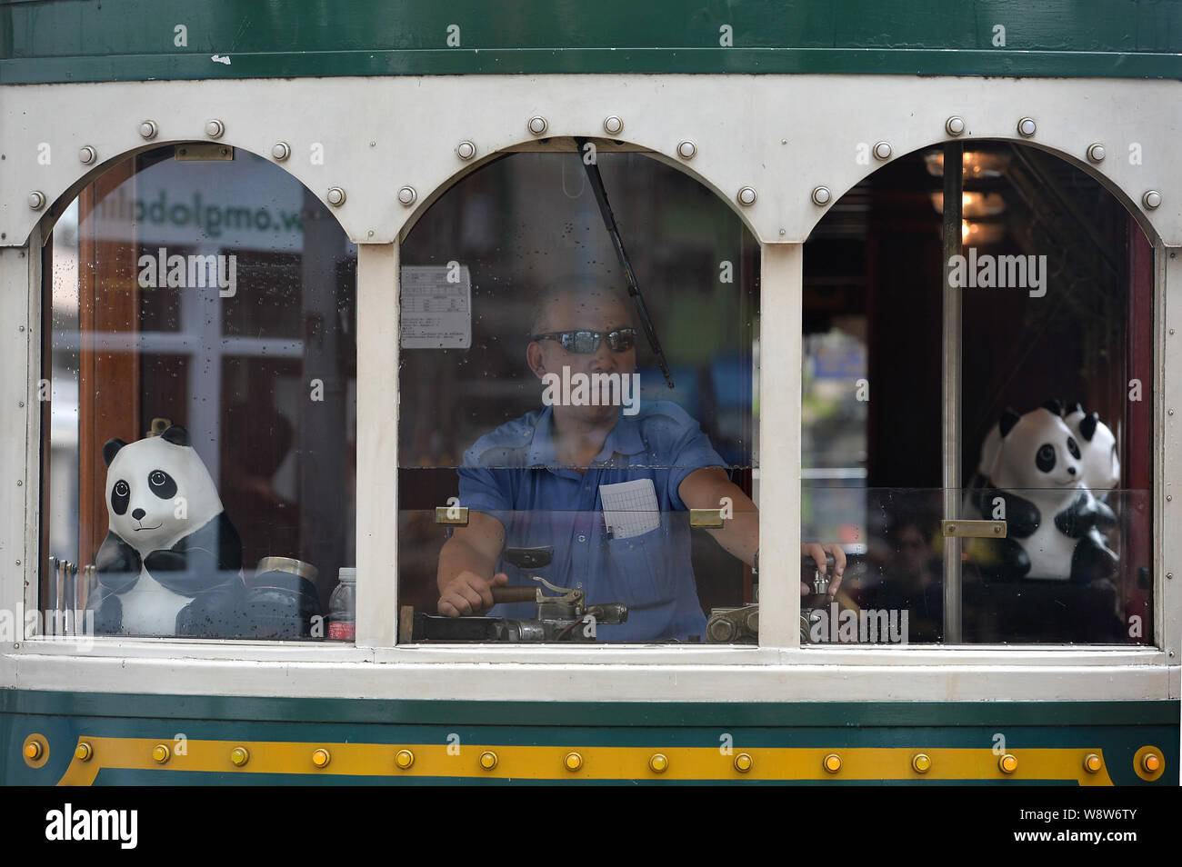 A double-decker tram with the paper pandas created by French artist ...