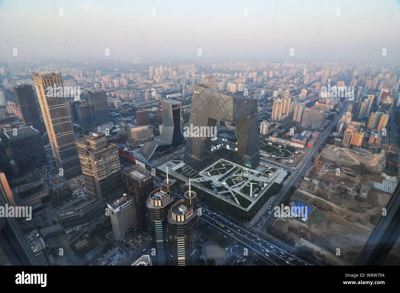 --FILE--View of the CCTV Tower, center, the headquarters of China ...