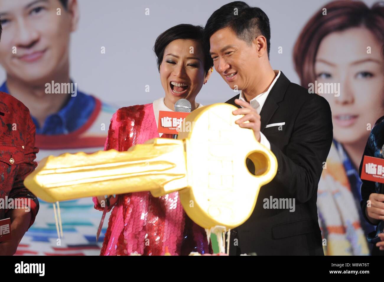 Hong Kong actress Sammi Cheng, left, and actor Nick Cheung interact ...