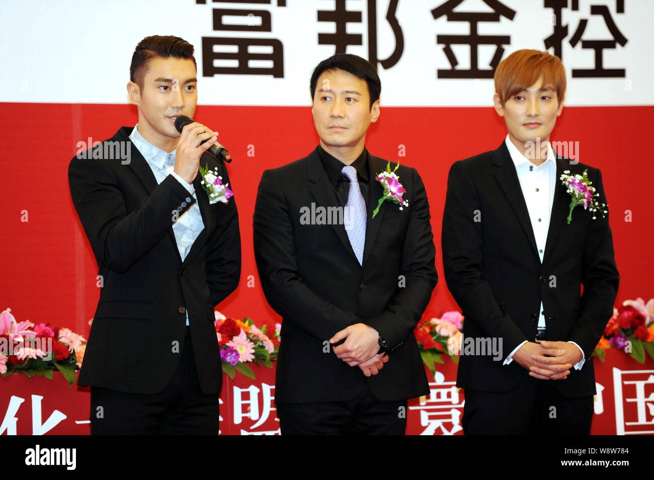 (From left) South Korean singer and actor Choi Siwon speaks next to ... (From left) South Korean singer and actor Choi Siwon speaks next to ...