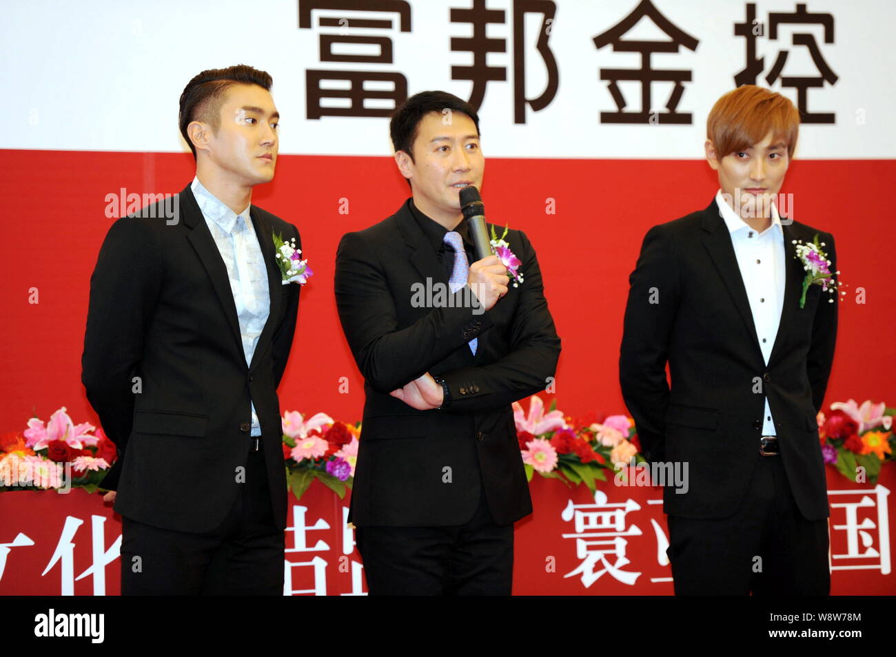 Hong Kong singer Leon Lai, center, speaks next to South Korean singers ... Hong Kong singer Leon Lai, center, speaks next to South Korean singers ...