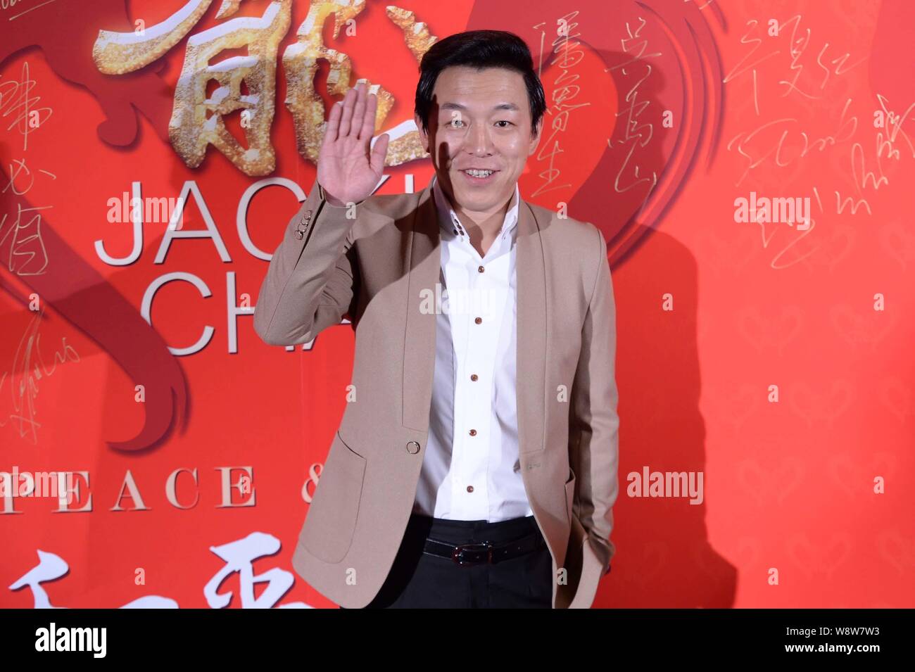 Chinese actor Huang Bo waves as he arrives for the Peace & Love banquet ...