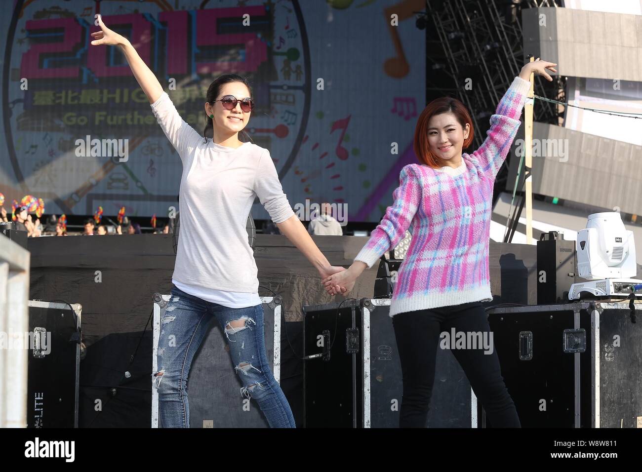 Ella Chen, left, and Selina Jen of Taiwanese girl group S.H.E pose ...