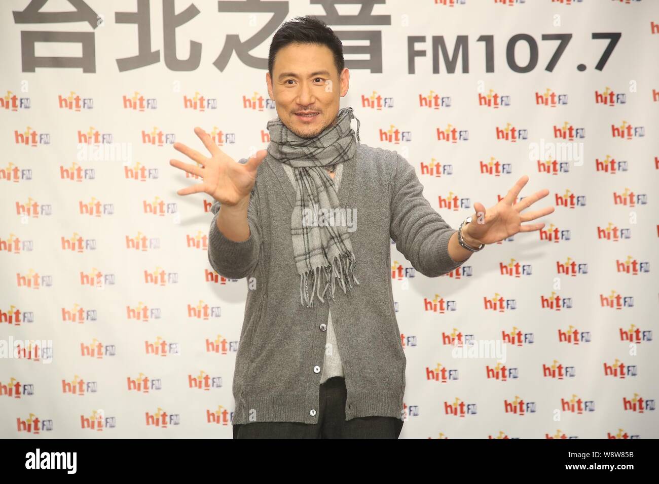 Hong Kong singer Jacky Cheung waves at a promotional event for his new ...
