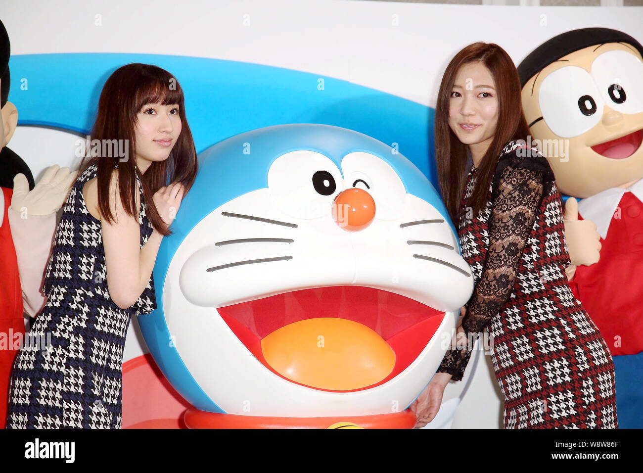 Japanese singers and actresses Haruka Katayama, left, and Misato Nonaka, both former members of ...
