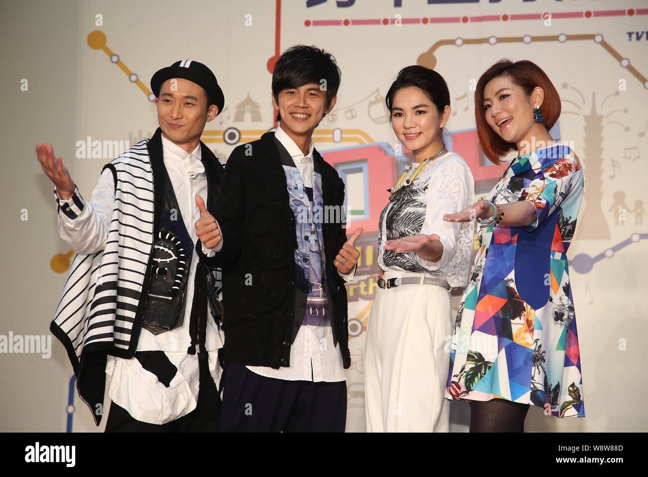 Ella Chen, second right, and Selina Jen, right, of Taiwanese girl group ...