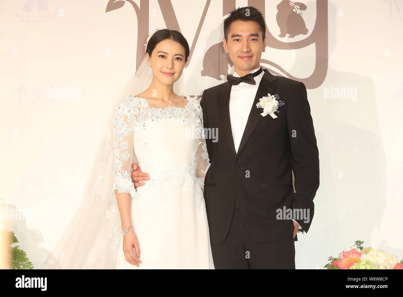 Chinese actress Gao Yuanyuan, left, and her Taiwanese actor husband ...