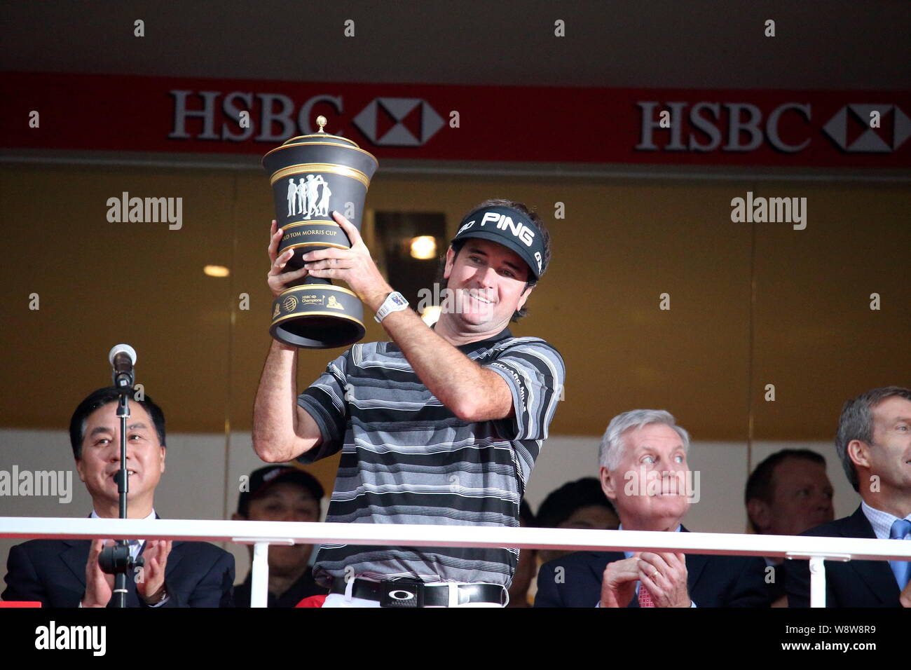 Bubba Watson of the United States, center, celebrates with his champion ...