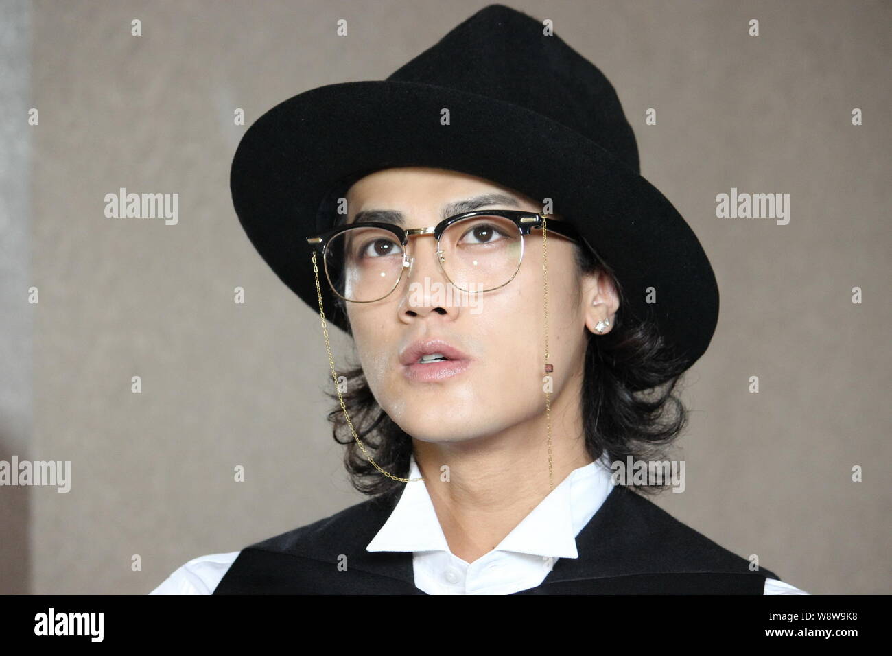 Japanese actor and singer Akanishi Jin speaks at an interview during ...