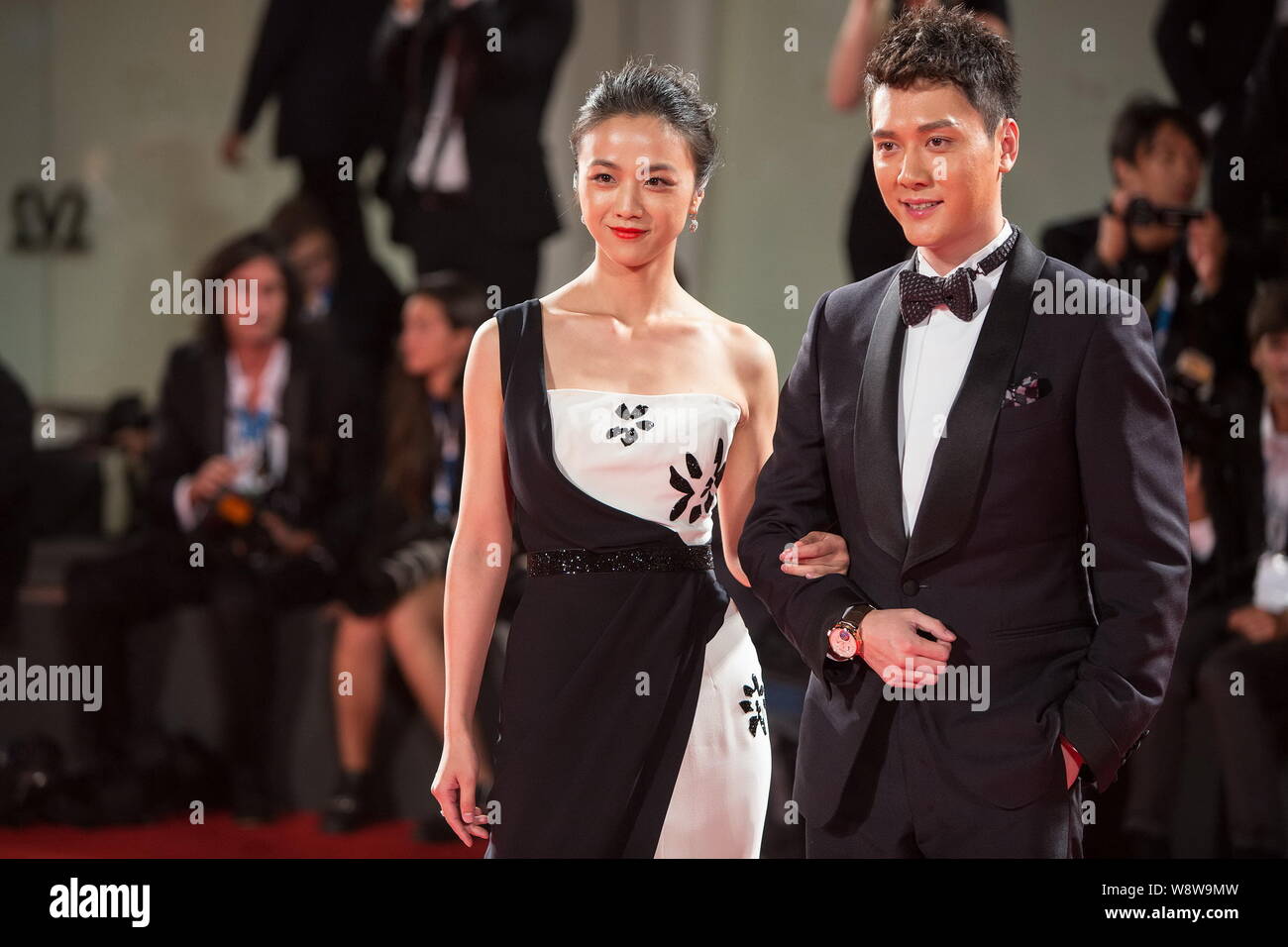 Chinese actress Tang Wei, left, and actor Sha Yi, pose on the red ...