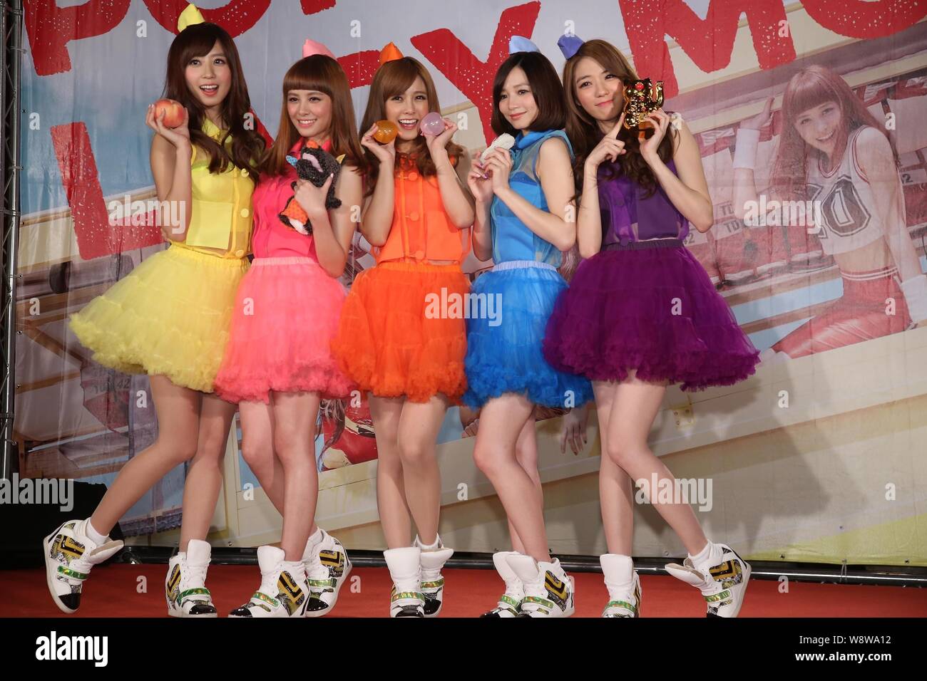 Members of Taiwanese pop gril group Popu Lady pose during a press ...