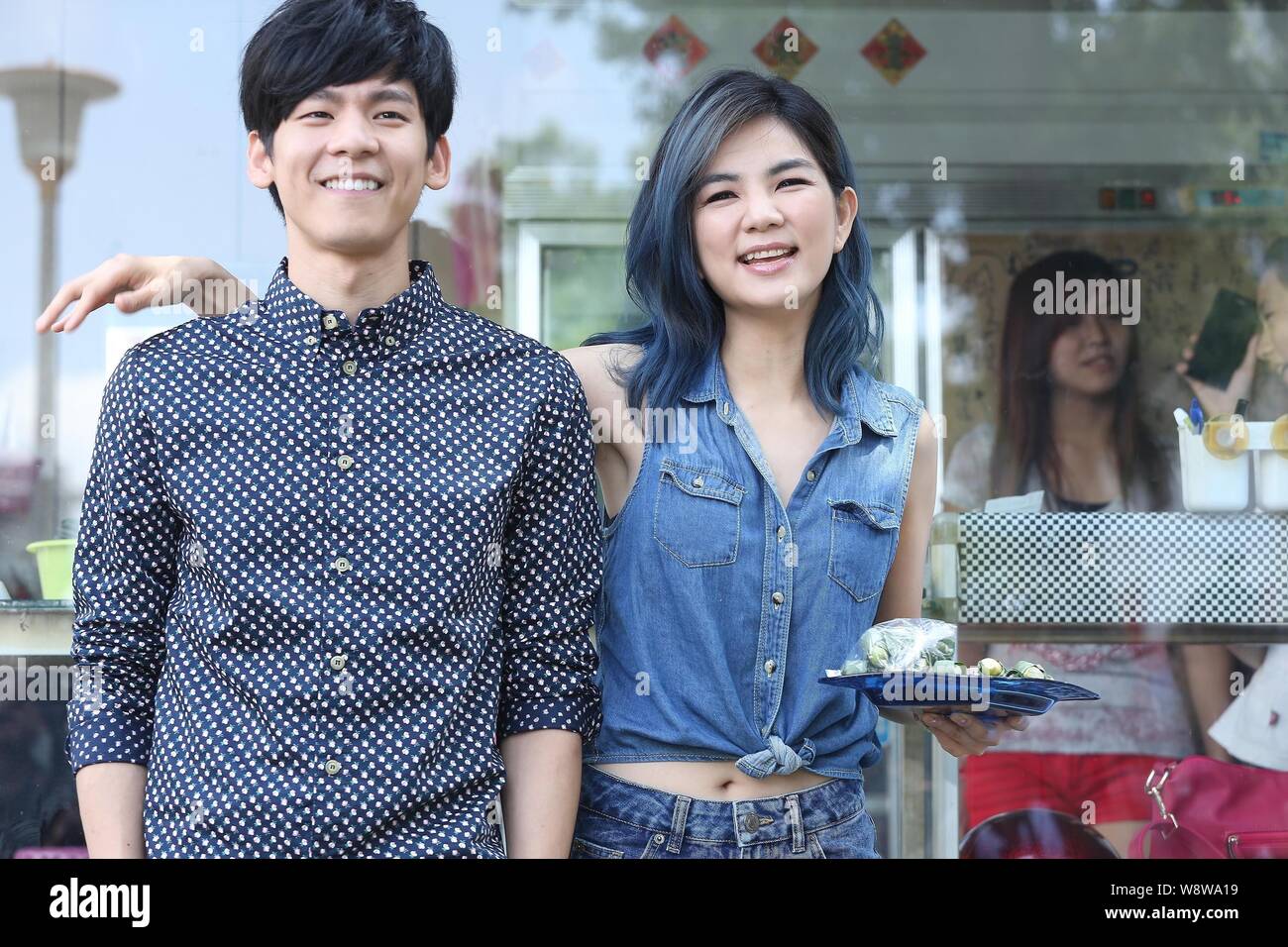 Ella Chen of Taiwanese girl group S.H.E (right) poses with actor and ...