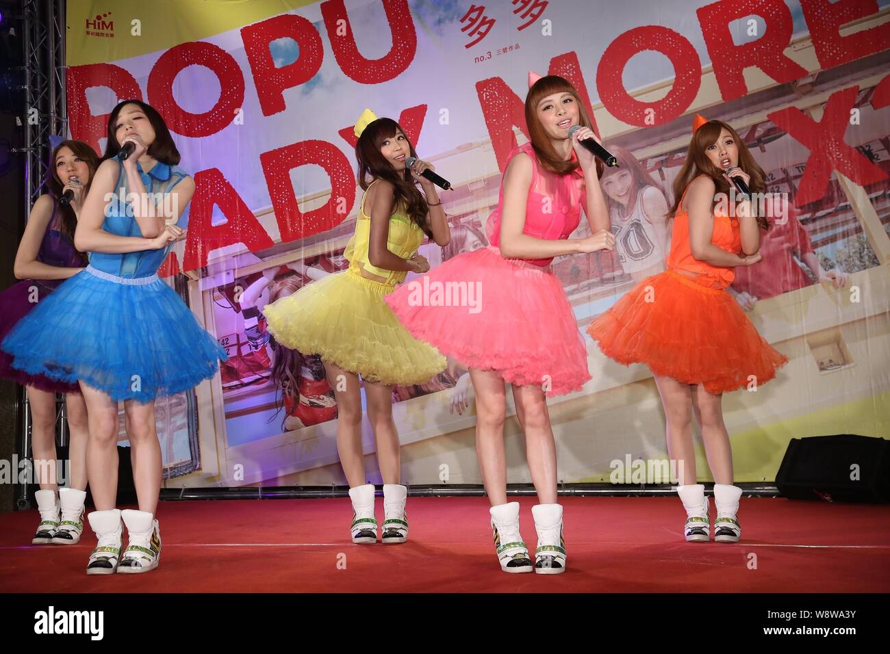 Members of Taiwanese pop gril group Popu Lady perform during a press ...
