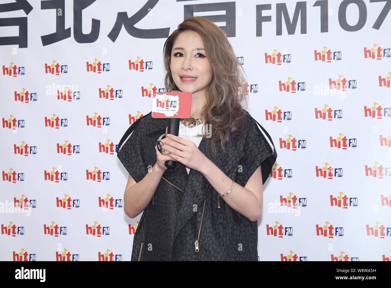 Taiwanese singer Elva Hsiao speaks during an interview at Hit FM radio station in Taipei, Taiwan ...