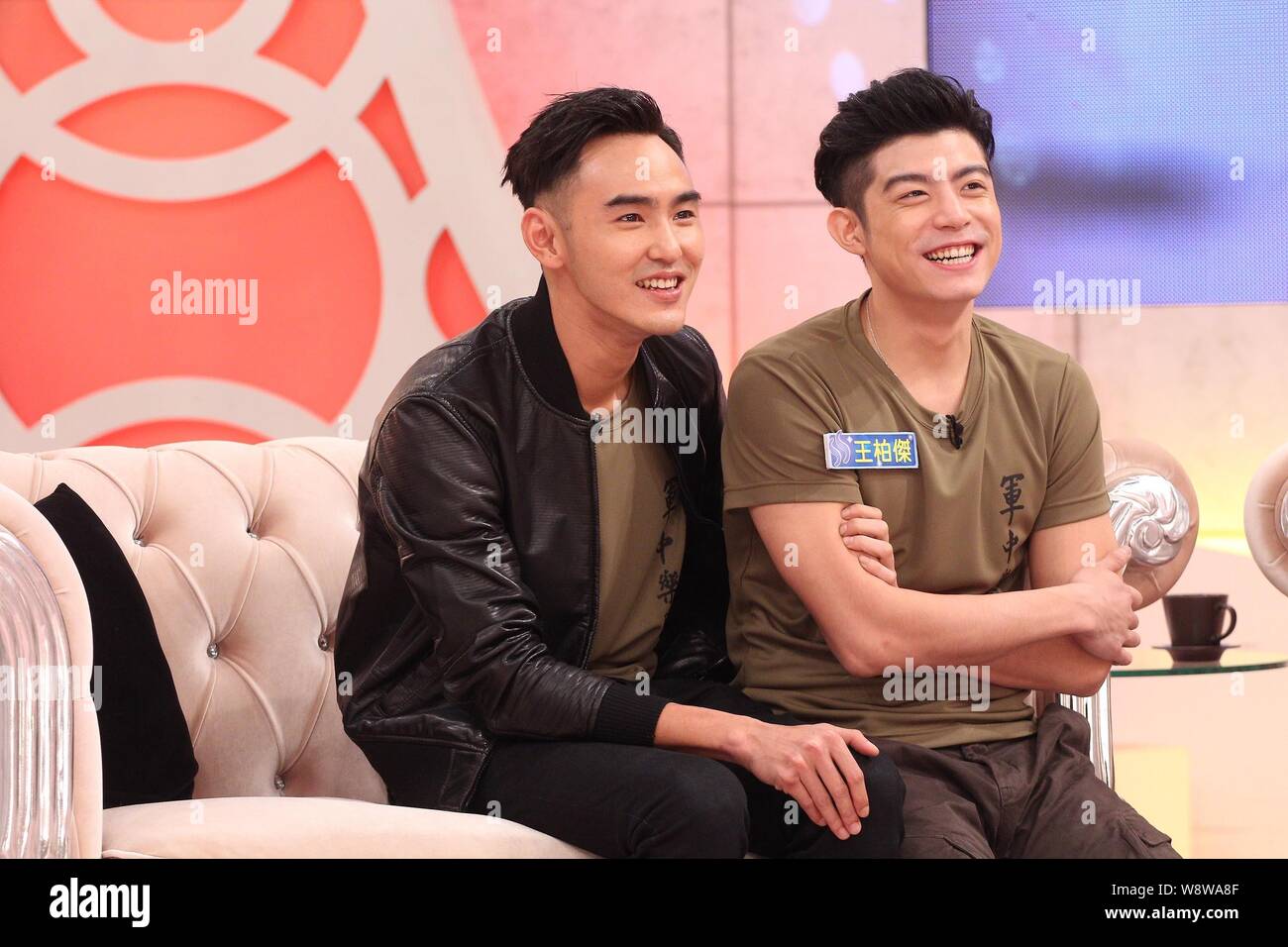 Taiwanese actors Ethan Juan, left, and Edison Wang attend a filming session of talk show "SS ...