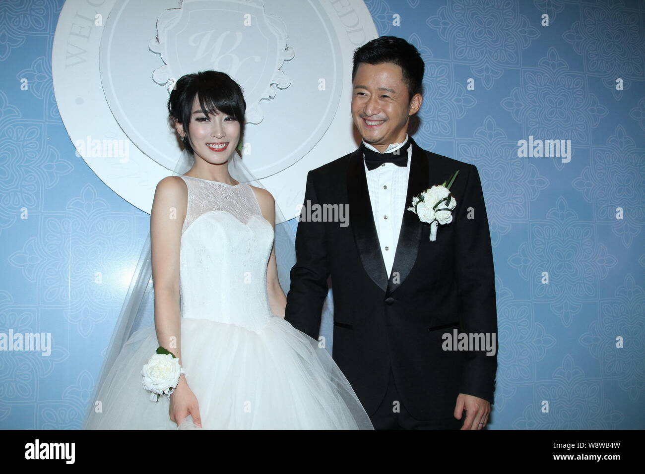 Chinese actor Wu Jing, right, and TV hostess Xie Nan pose at their ...