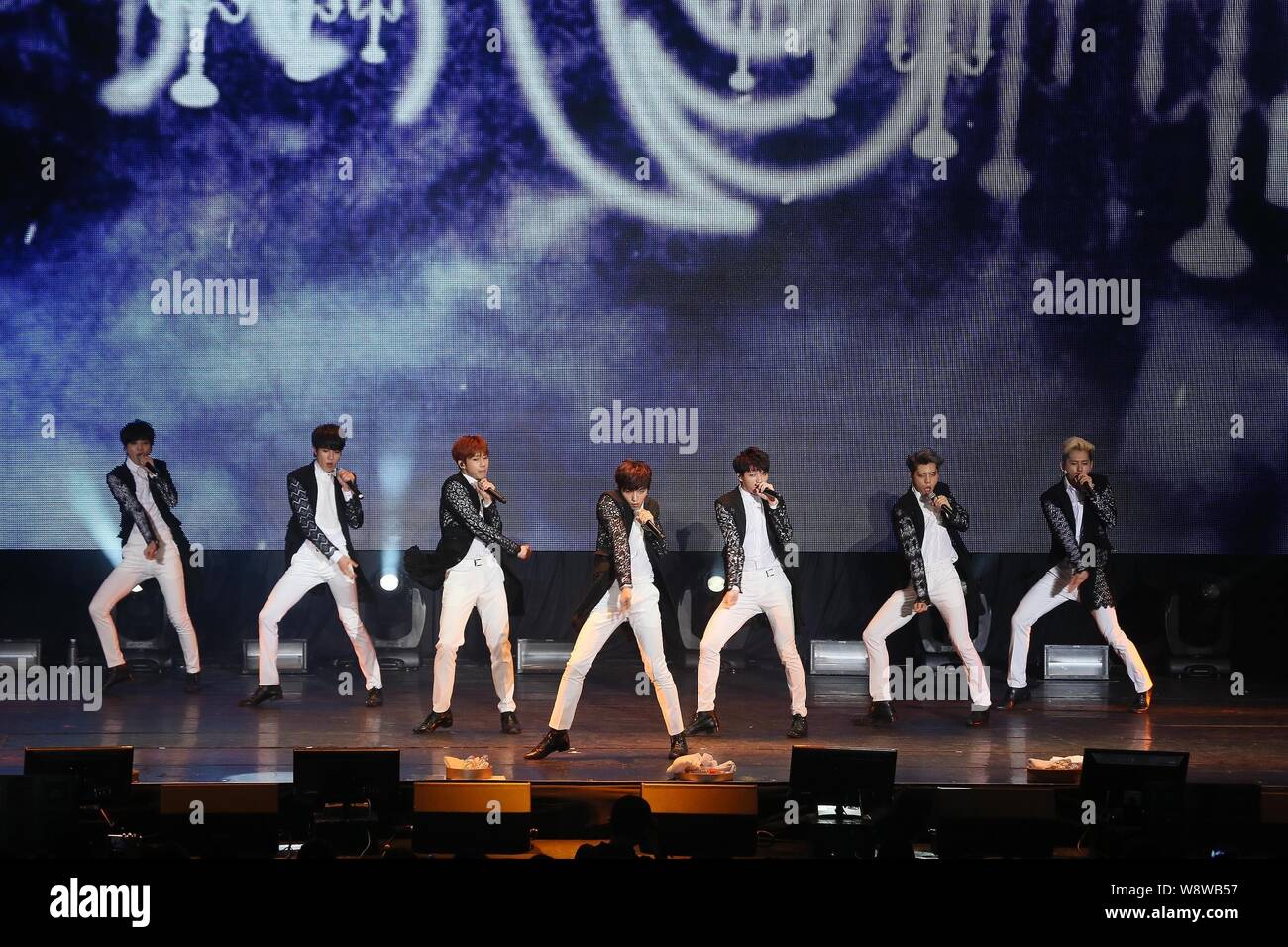 Members of South Korean boy group Infinite perform during a press ...