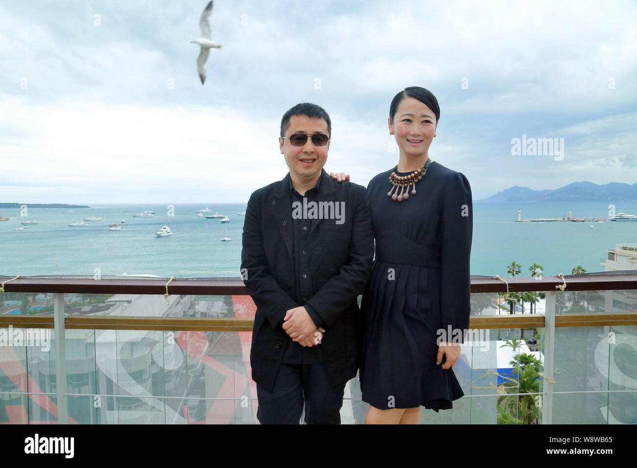 Chinese director Jia Zhangke, left, and his actress wife Zhao Tao pose ...