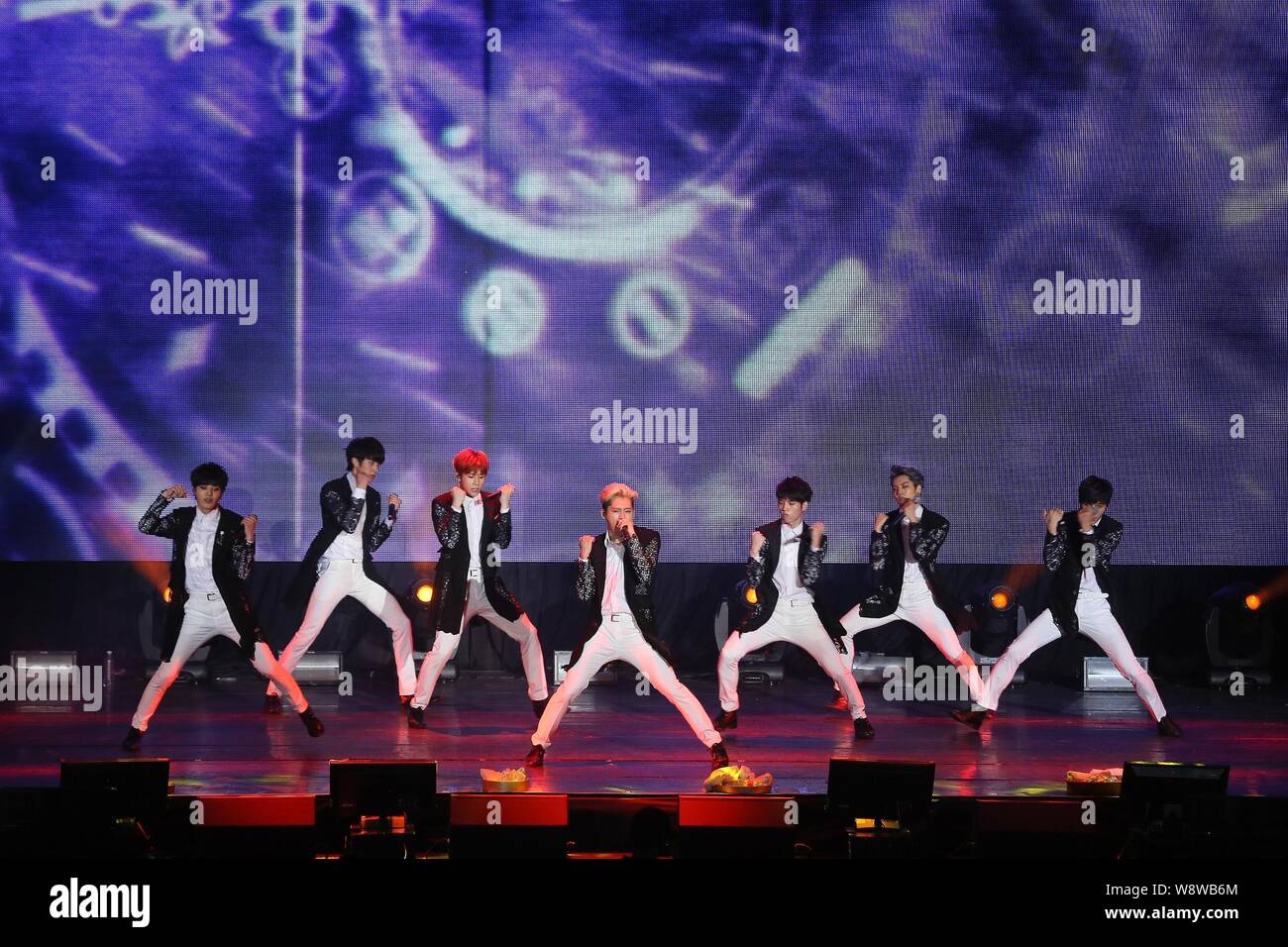 Members of South Korean boy group Infinite perform during a press ...