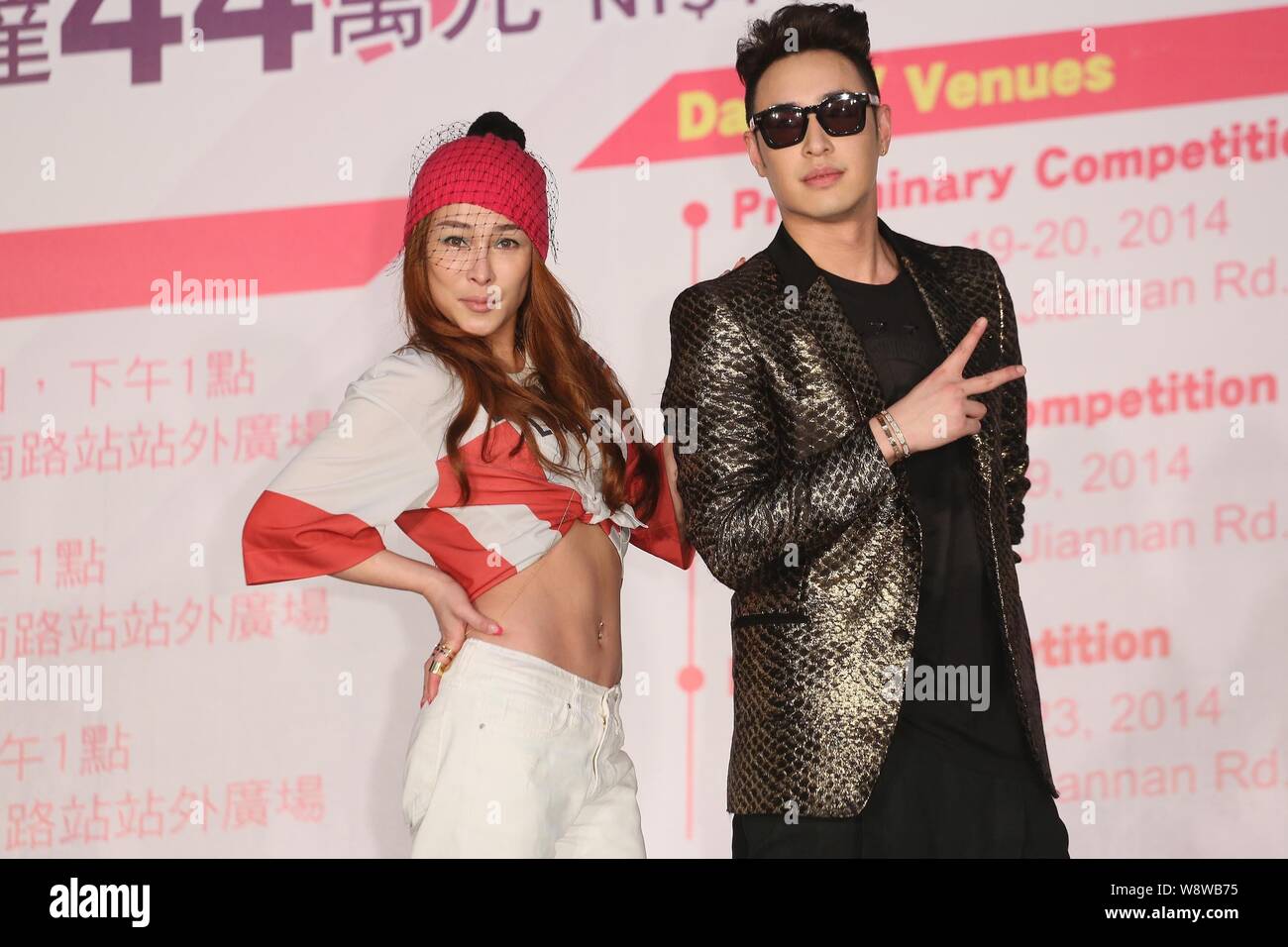 Taiwanese singers Landy Wen, left, and Wilber Pan pose at a press ...