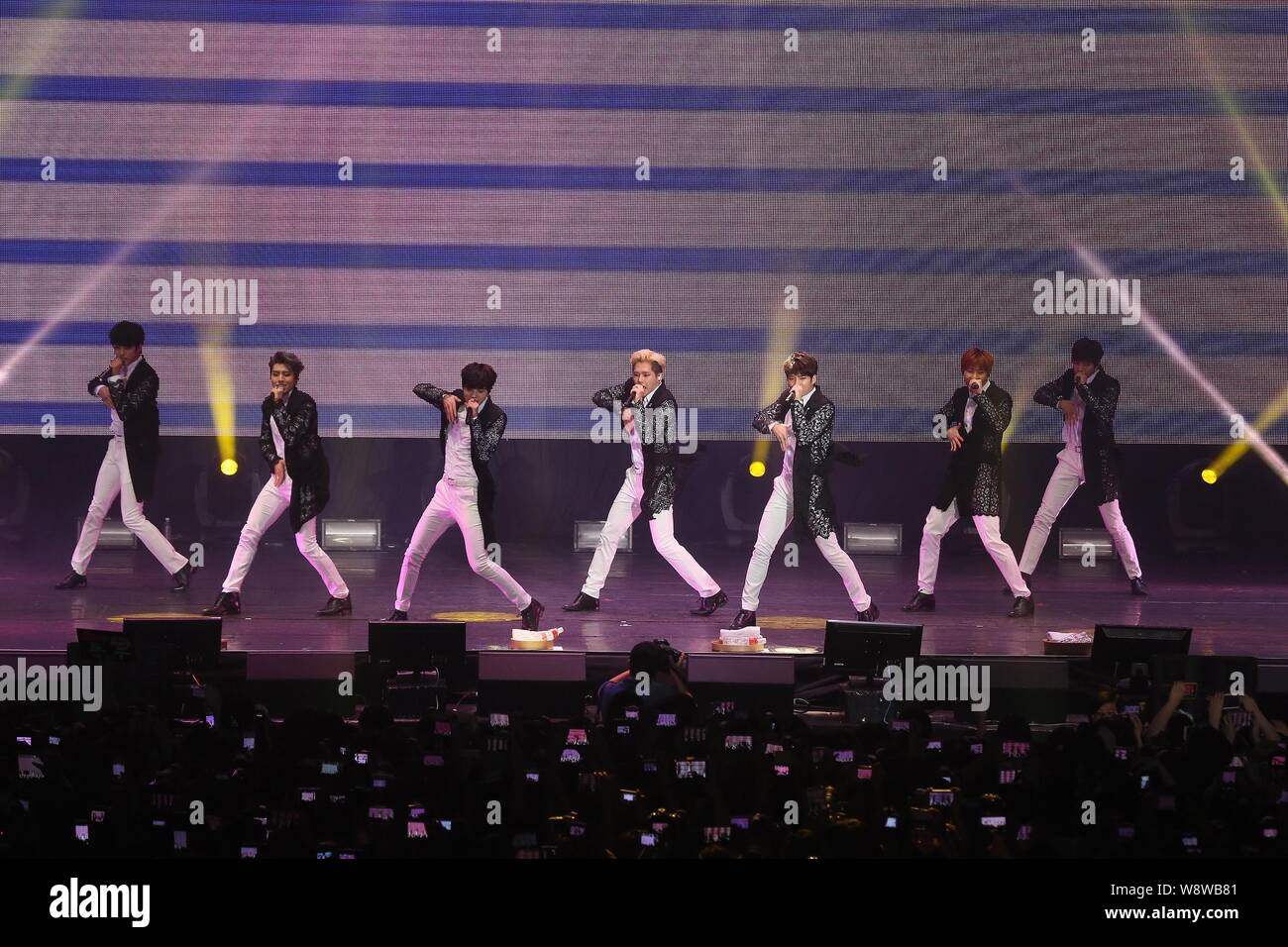Members of South Korean boy group Infinite perform during a press ...