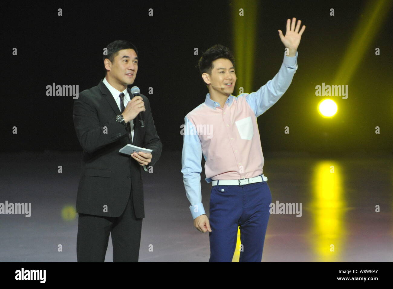 Taiwanese singer and actor Jimmy Lin, right, waves to guests and fans ...