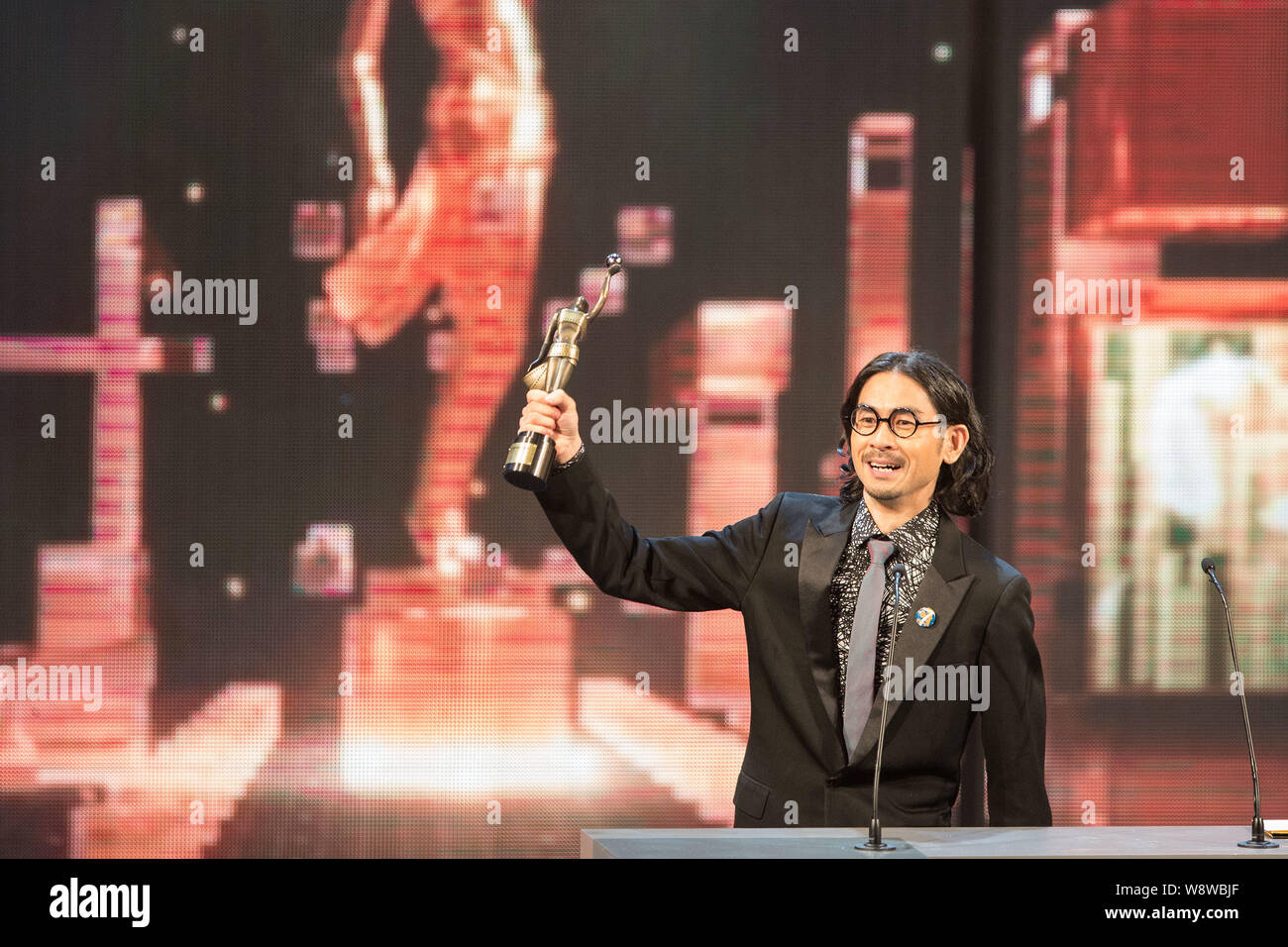 Hong Kong director Adam Wong speaks after winning the Best New Director ...