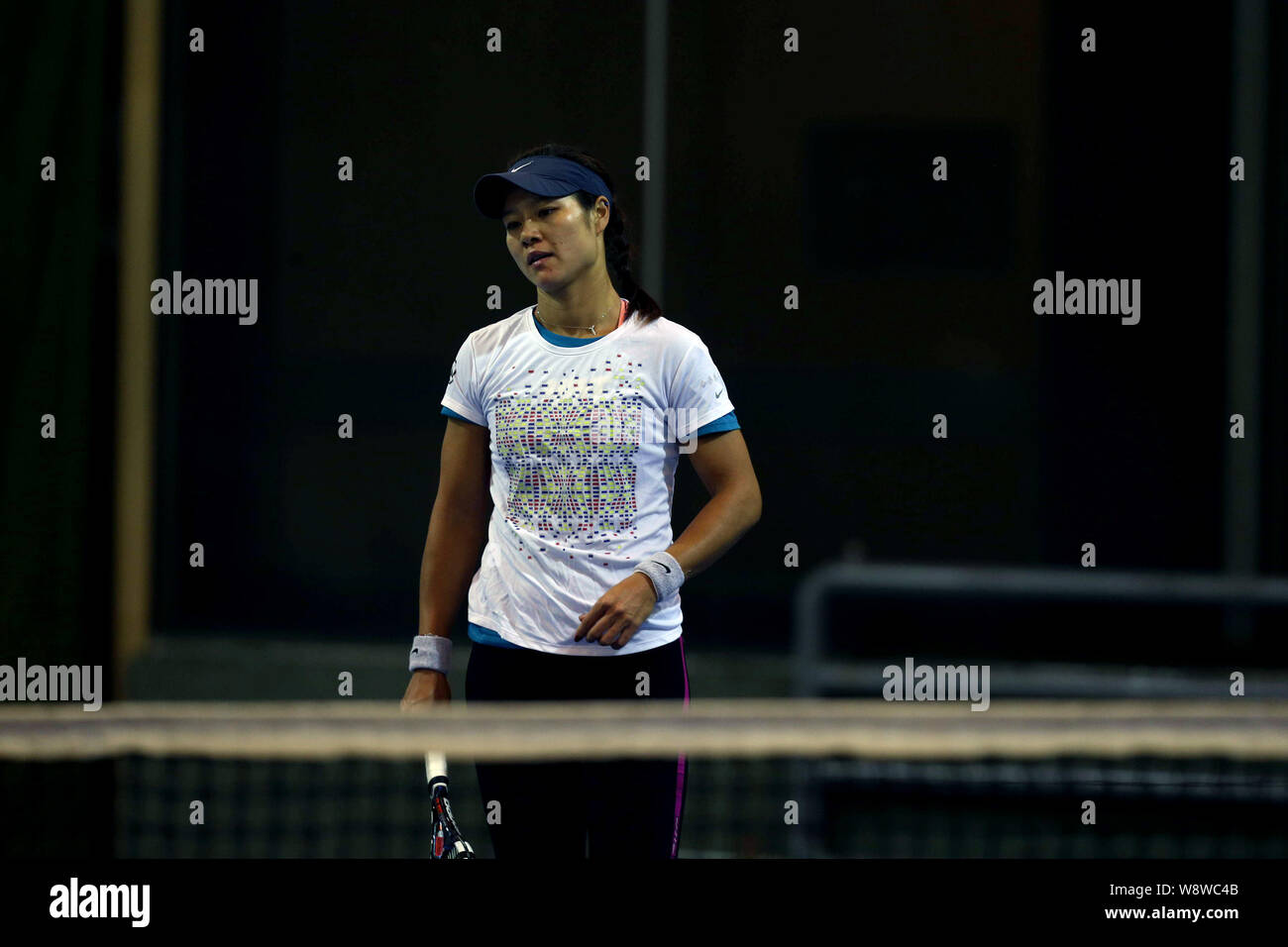 Chinese tennis star Li Na takes part in a training session in Beijing ...