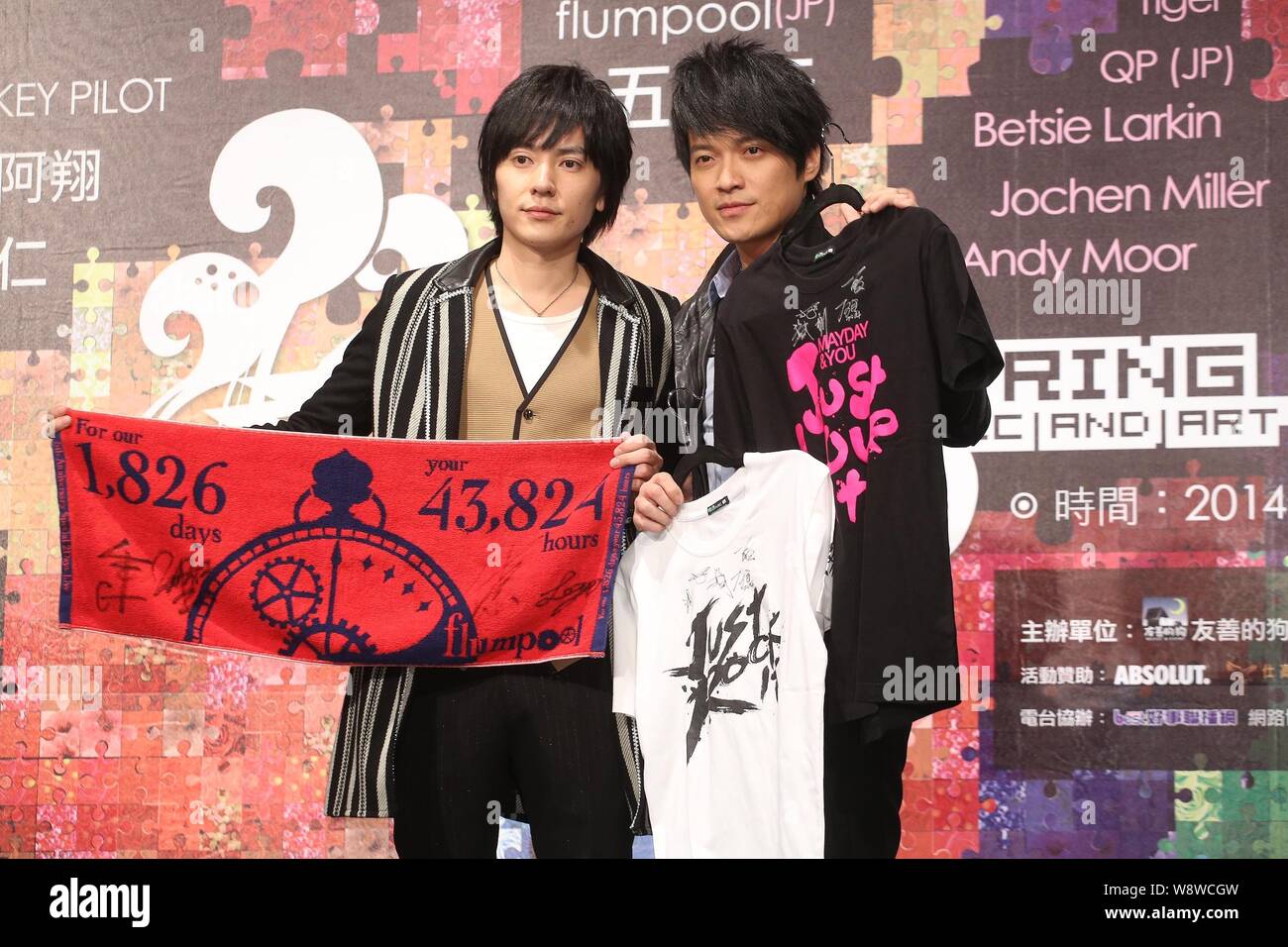Ryuta Yamamura of Japanese band flumpool, left, and Wen Shang-Yi, better known by his nickname ...