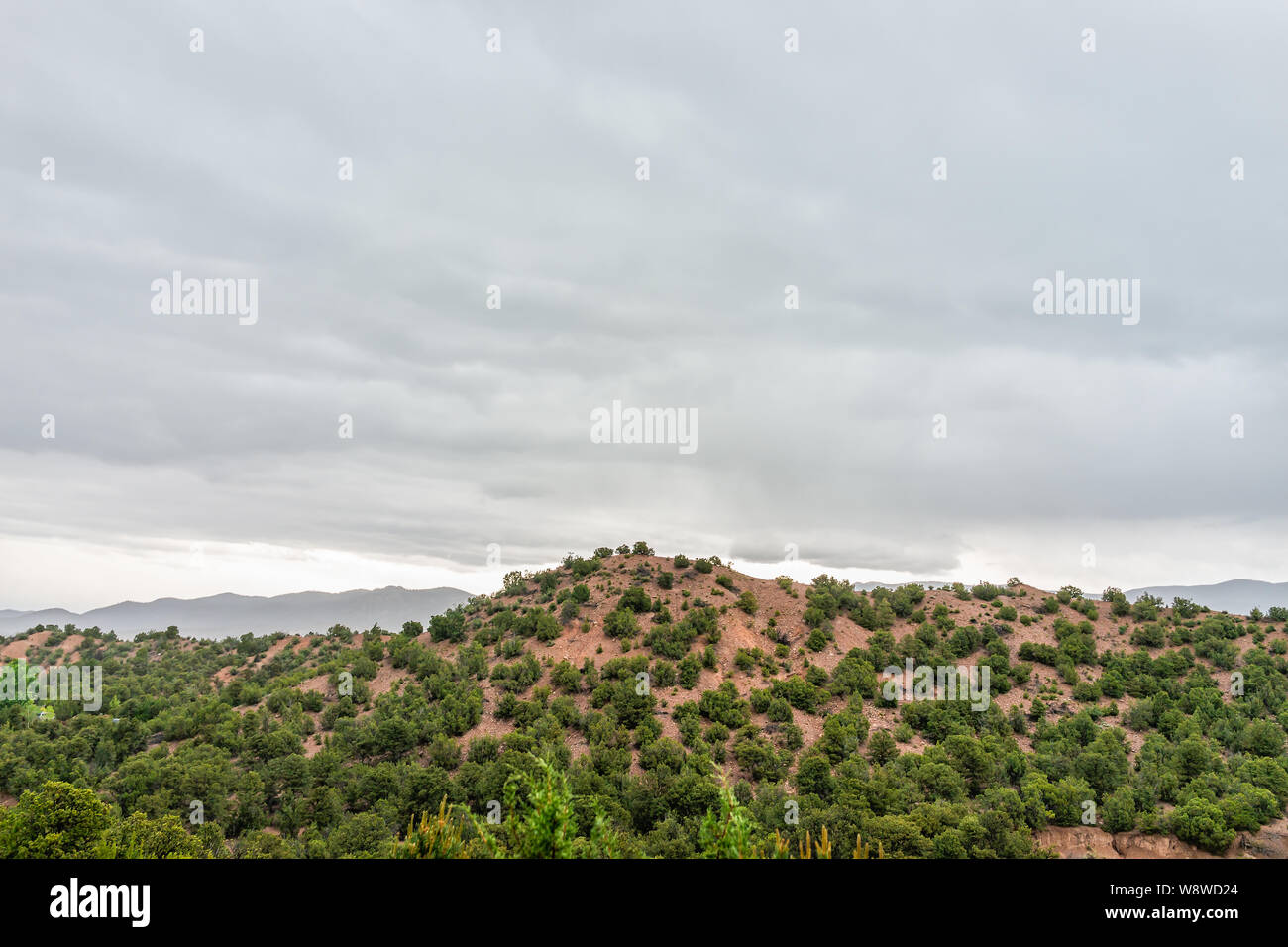 Storm clouds and mountain tesuque hi-res stock photography and images ...