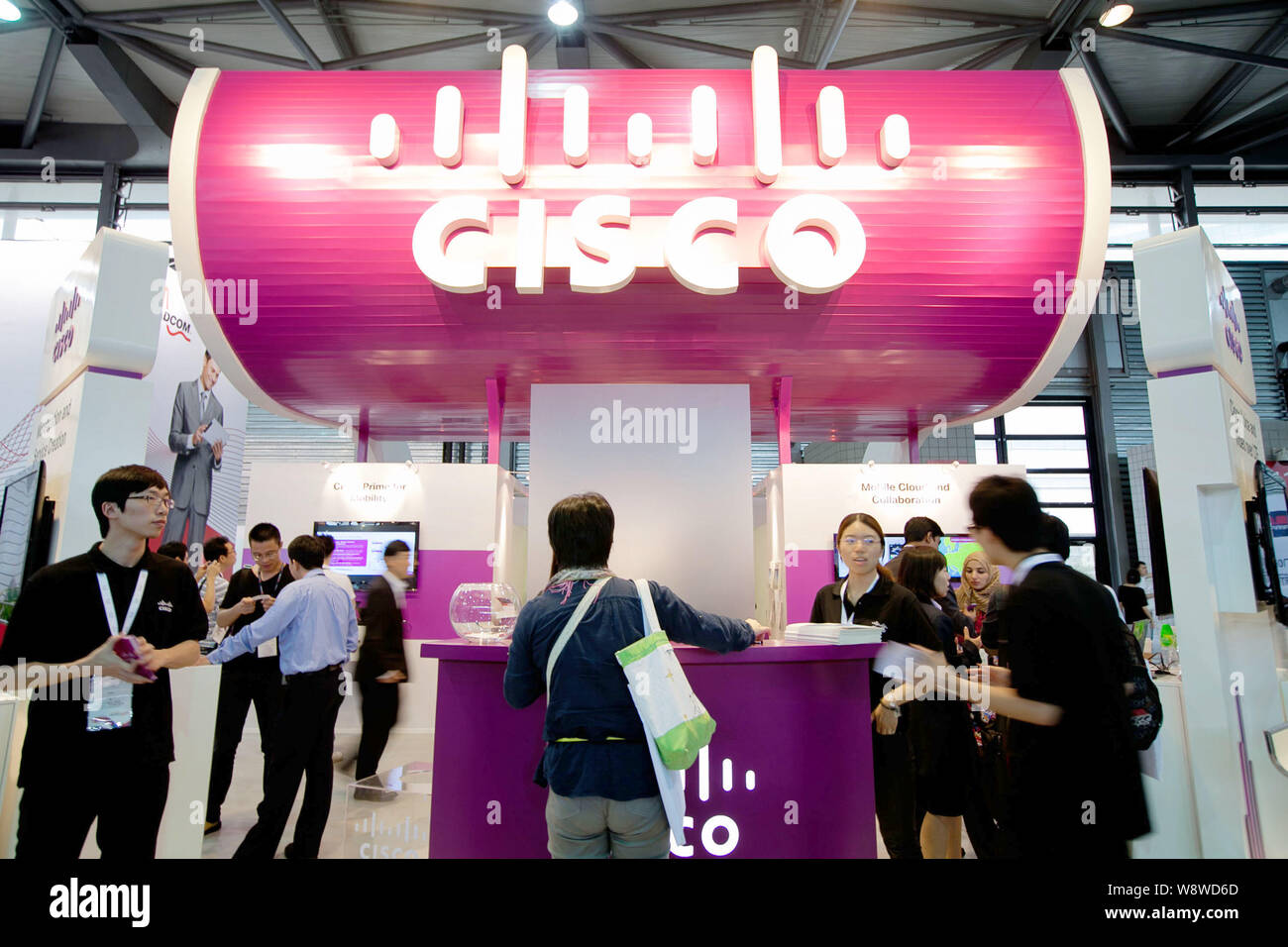 --FILE--People visit the stand of Cisco during the Mobile Asia Expo ...