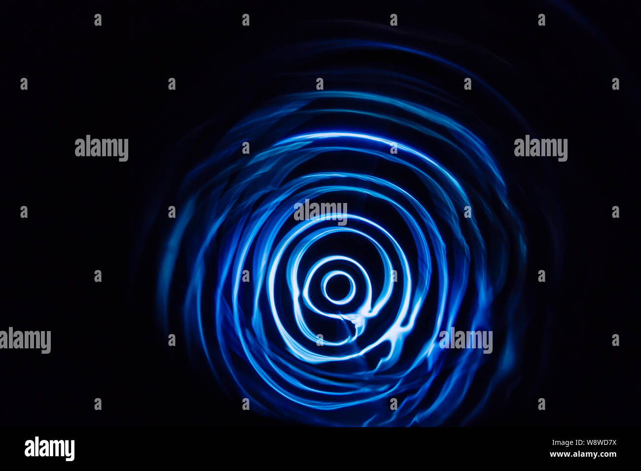 Sound waves in the dark. Blue color Stock Photo - Alamy