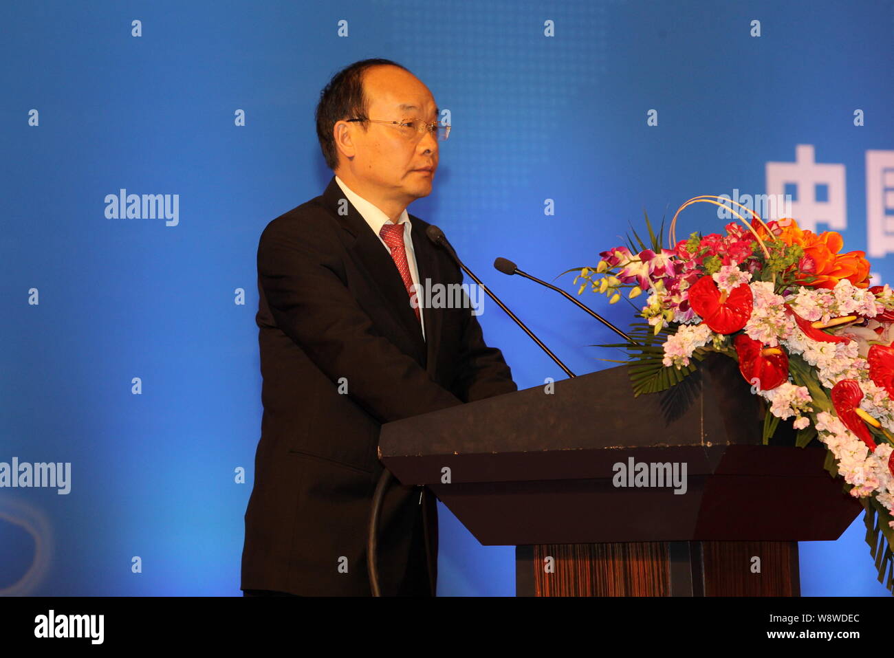 Xu Ping, CEO of Dongfeng Motor Group, delivers a speech during a ...