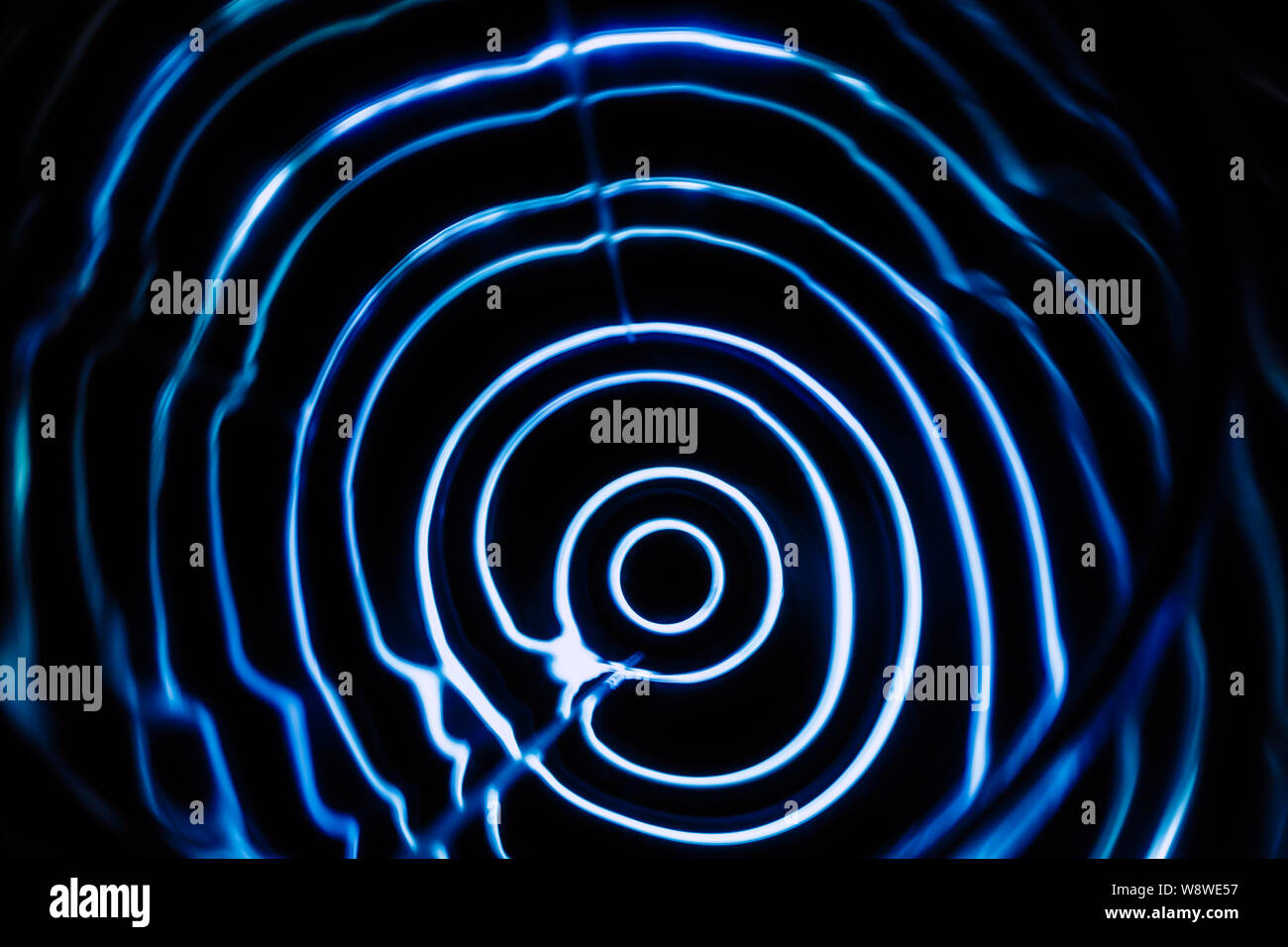 Sound waves in the dark. Blue color Stock Photo - Alamy