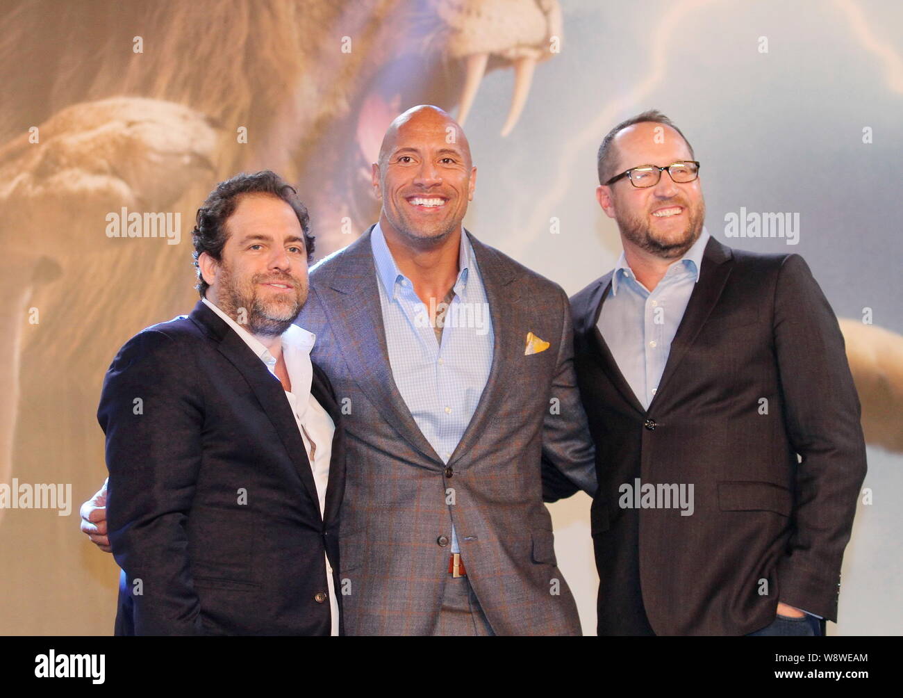 (From left) American director Brett Ratner, actor Dwayne Johnson and ...