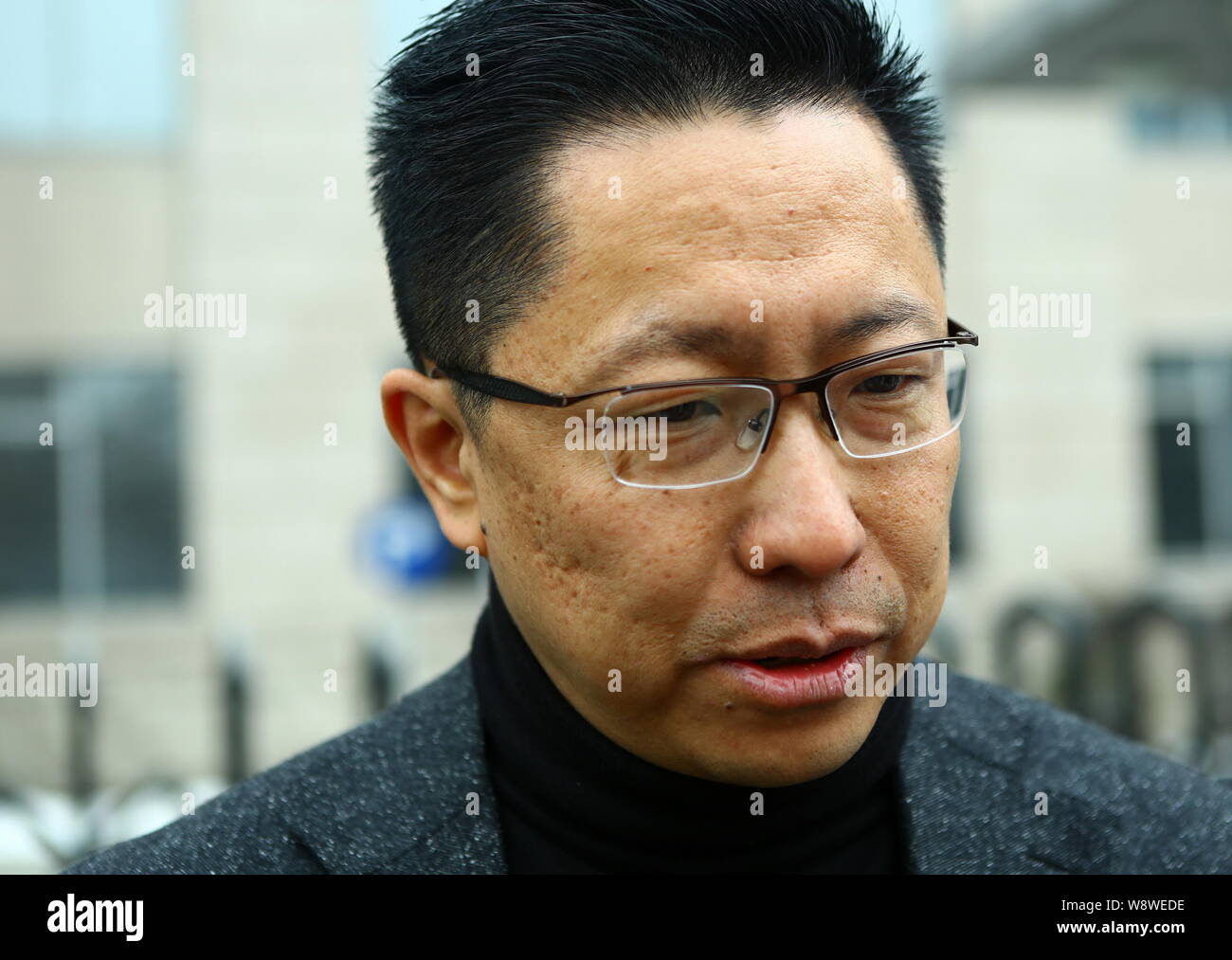 --FILE--Li Yang, founder of Crazy English, is interviewed as he leaves ...
