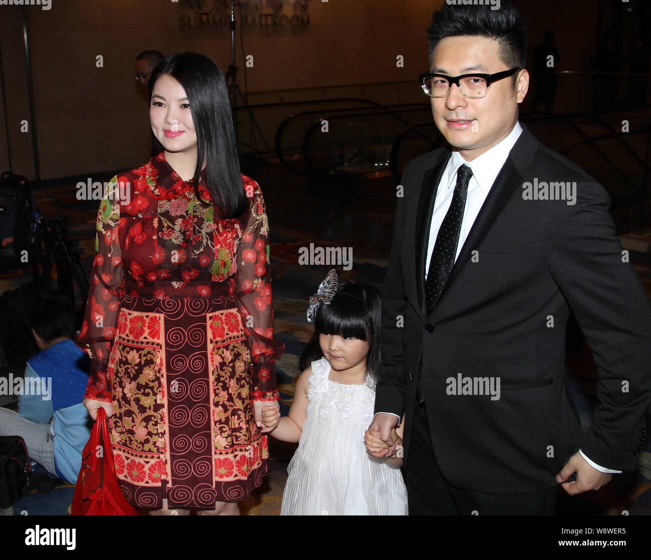 Chinese director Wang Yuelun, right, TV hostess Li Xiang, left, and ...