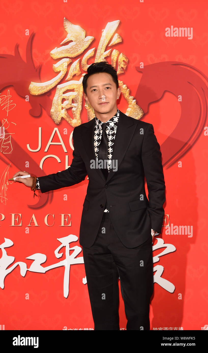 Chinese singer and actor Han Geng poses as he arrives for the Peace ...