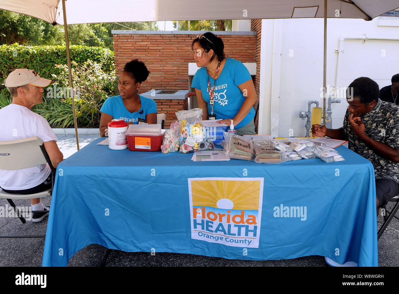 Disease seated hi-res stock photography and images - Alamy