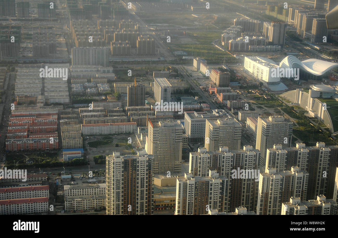 --FILE--Aerial view of residential houses and apartment buildings in ...