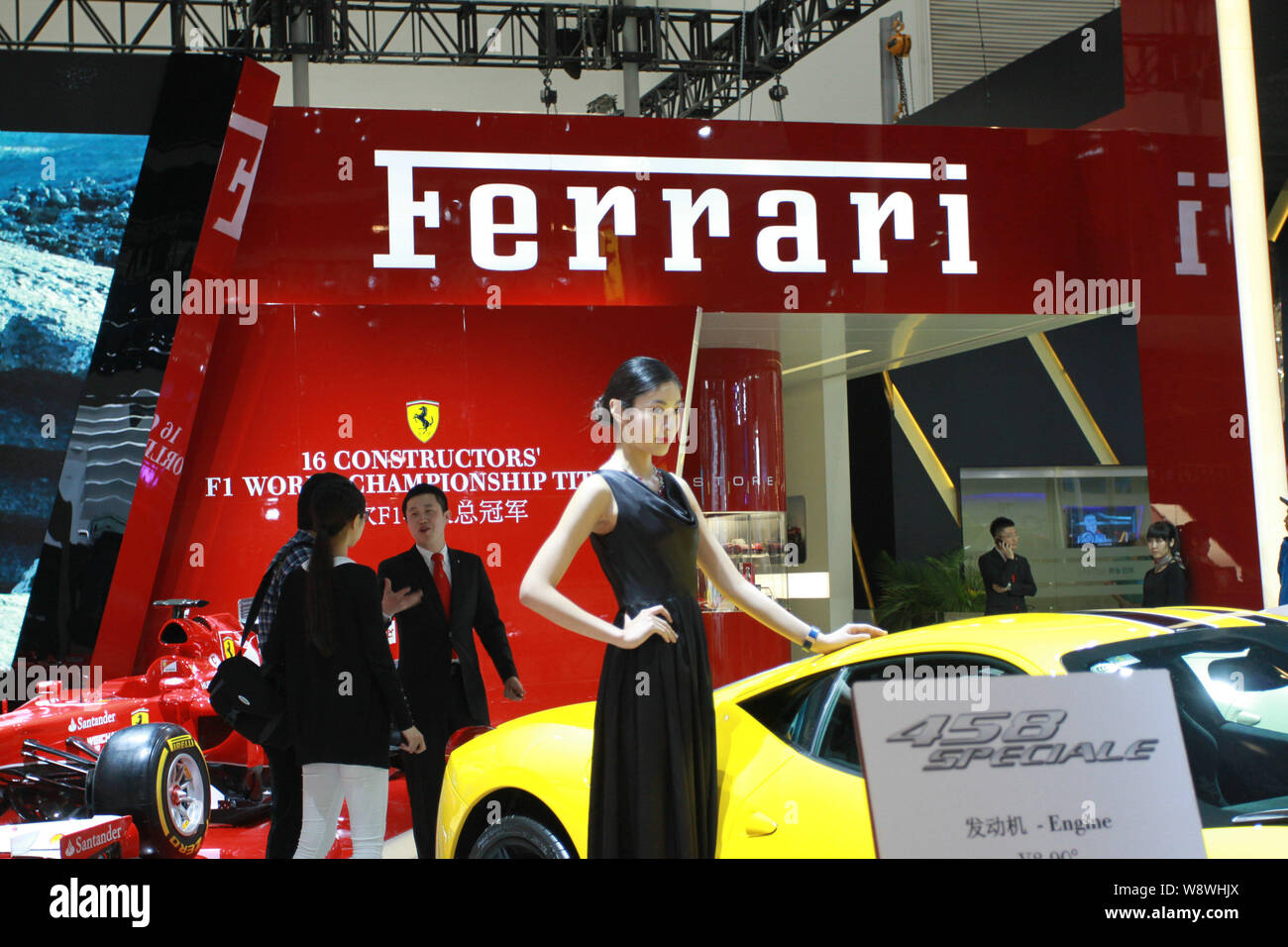--FILE--A model poses with a Ferrari 458 Speciale during the 13th ...